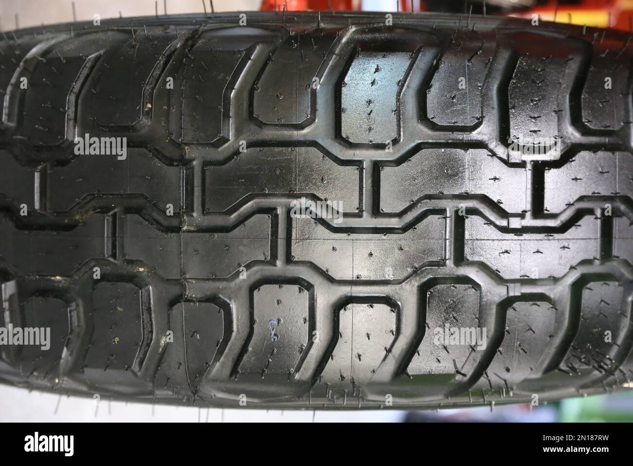 Details of tractor tire. Detail of large wheel. Heavy black wheel ...