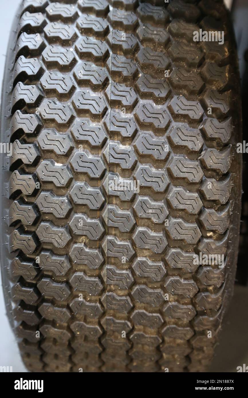 Details of tractor tire. Detail of large wheel. Heavy black wheel ...