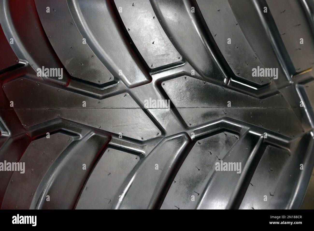 Details of tractor tire. Detail of large wheel. Heavy black wheel ...