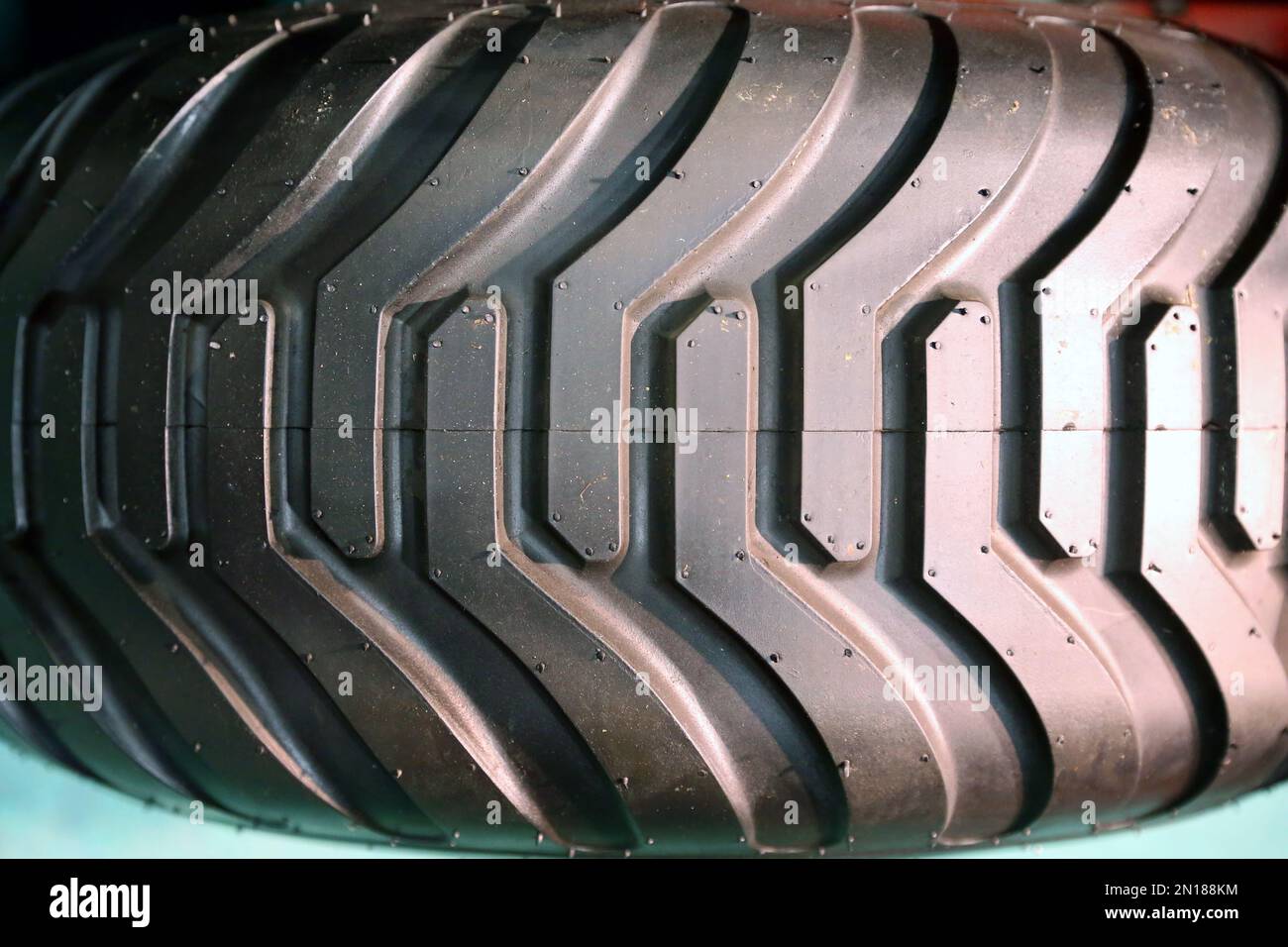 Details of tractor tire. Detail of large wheel. Heavy black wheel ...