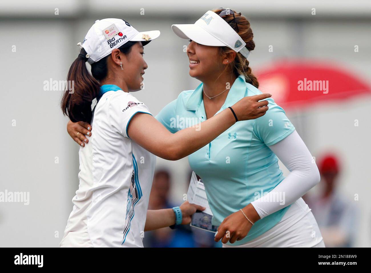 Xi Yu Lin, left, of South Korea and Alison Lee of the United States ...