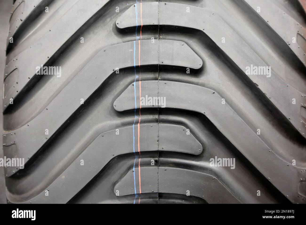 Details of tractor tire. Detail of large wheel. Heavy black wheel ...