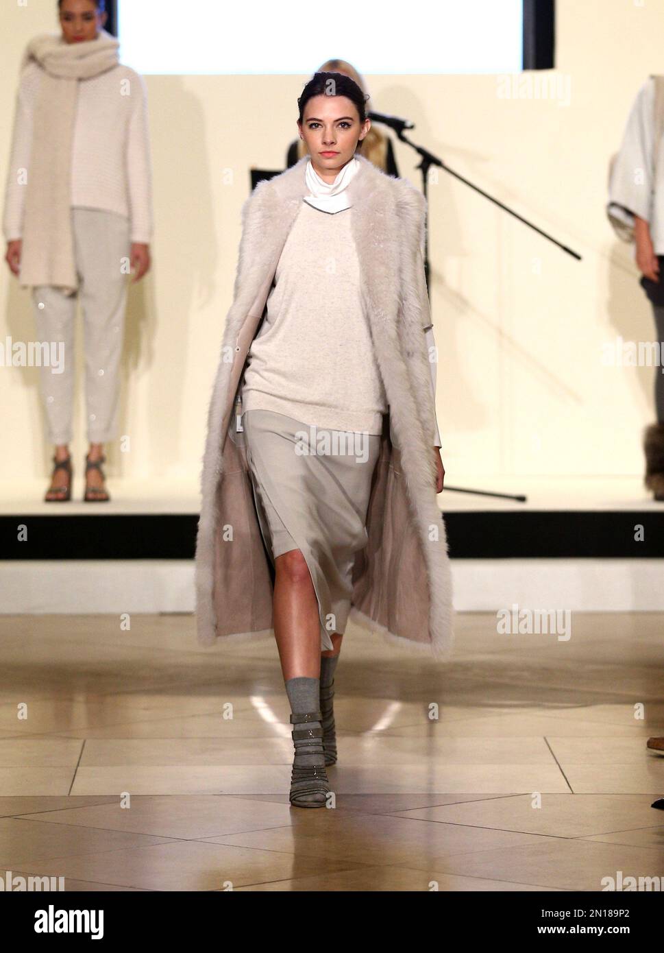 A model walks the runway in Brunello Cucinelli at Live the Look at ...