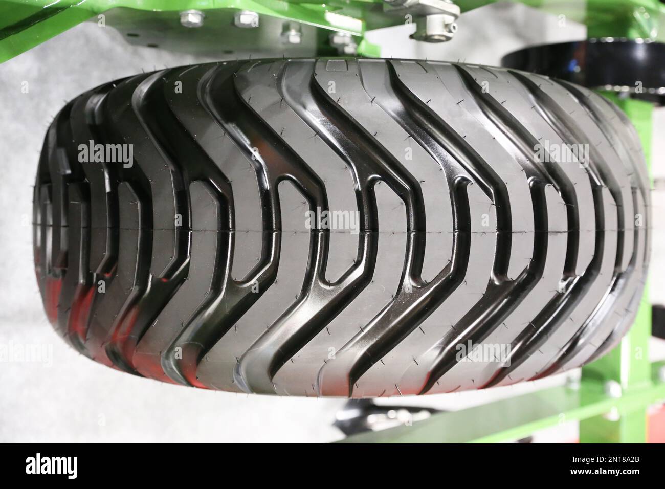 Details of tractor tire. Detail of large wheel. Heavy black wheel ...