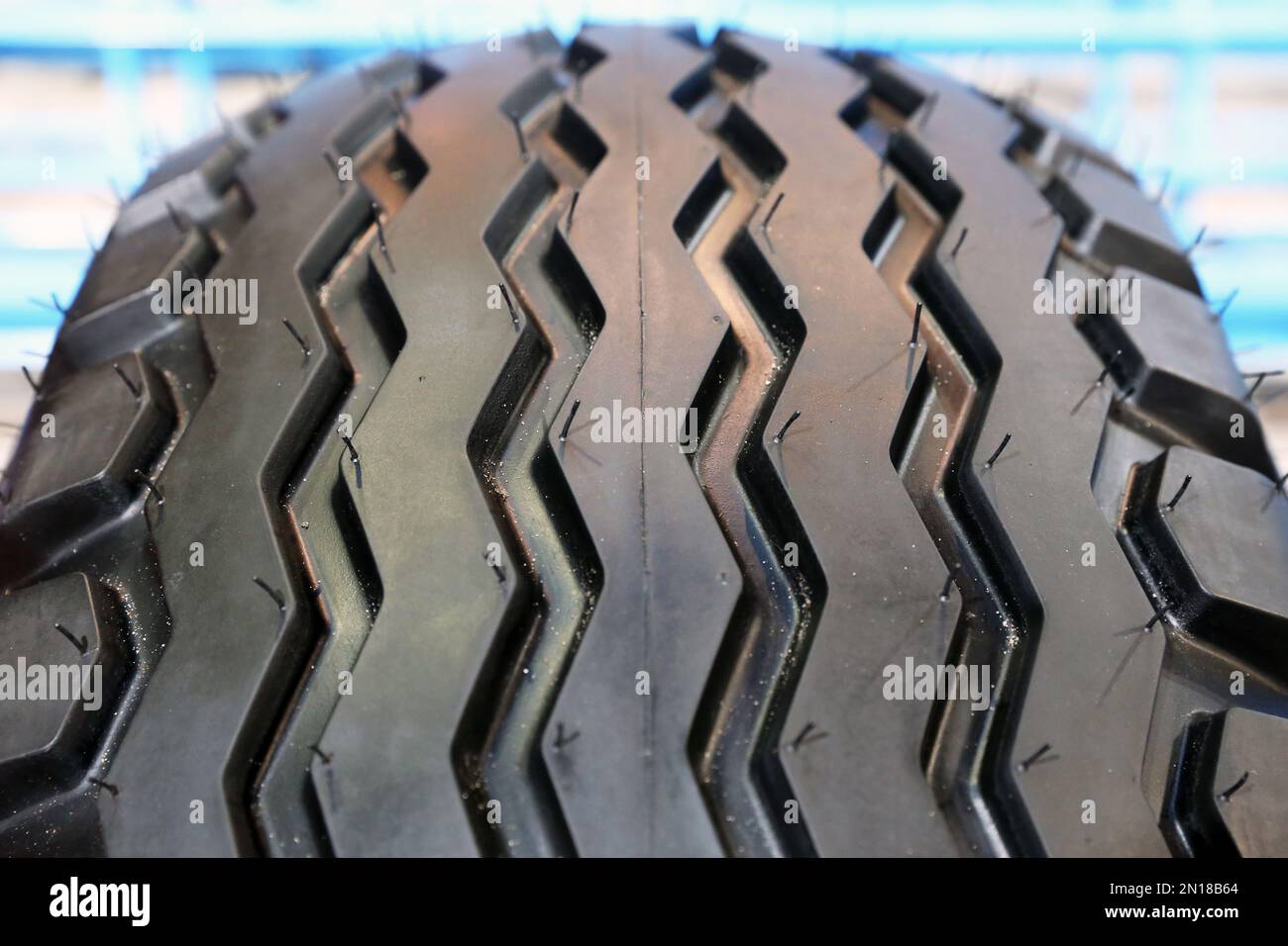 Details of tractor tire. Detail of large wheel. Heavy black wheel ...