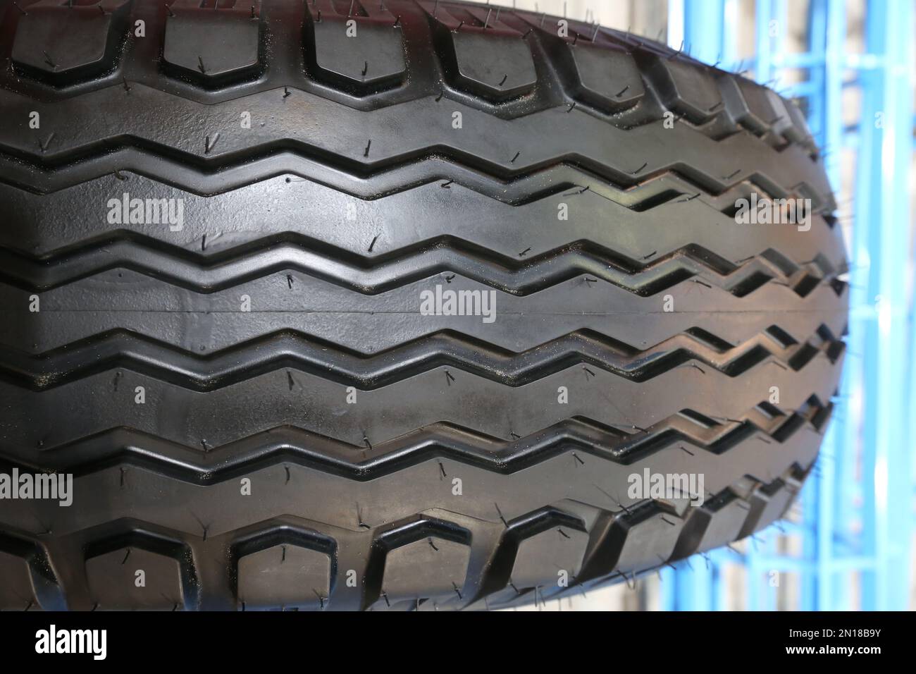 Details of tractor tire. Detail of large wheel. Heavy black wheel ...