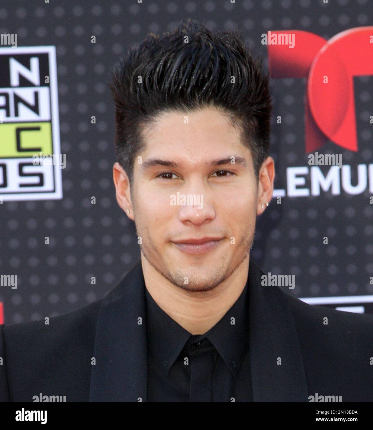 Chino arrives at the Latin American Music Awards at the Dolby Theatre ...