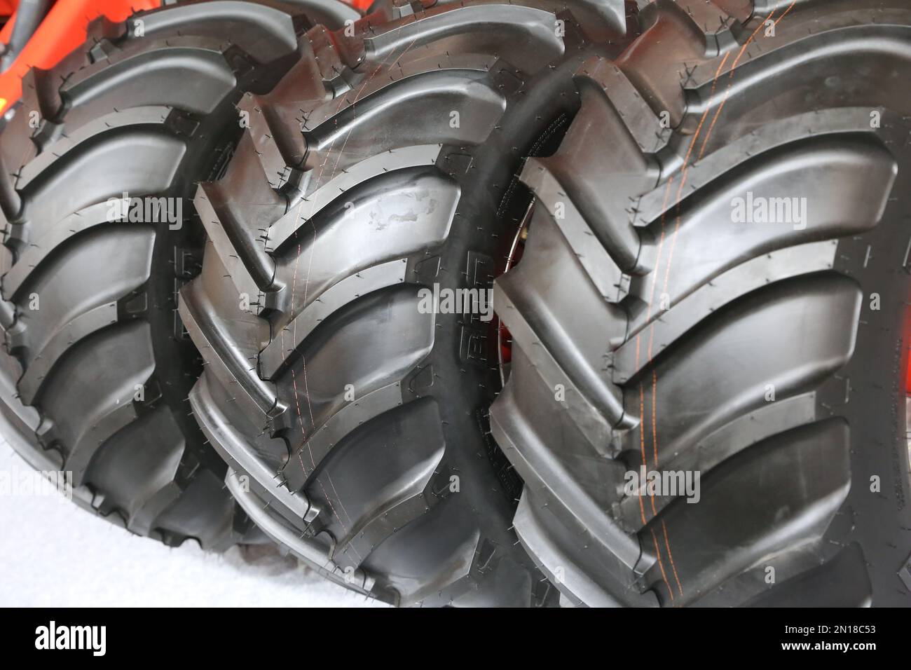 Details of tractor tire. Detail of large wheel. Heavy black wheel ...