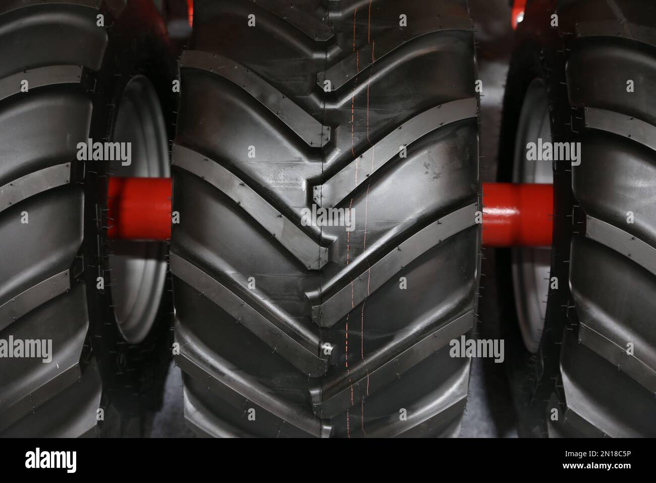 Details of tractor tire. Detail of large wheel. Heavy black wheel ...
