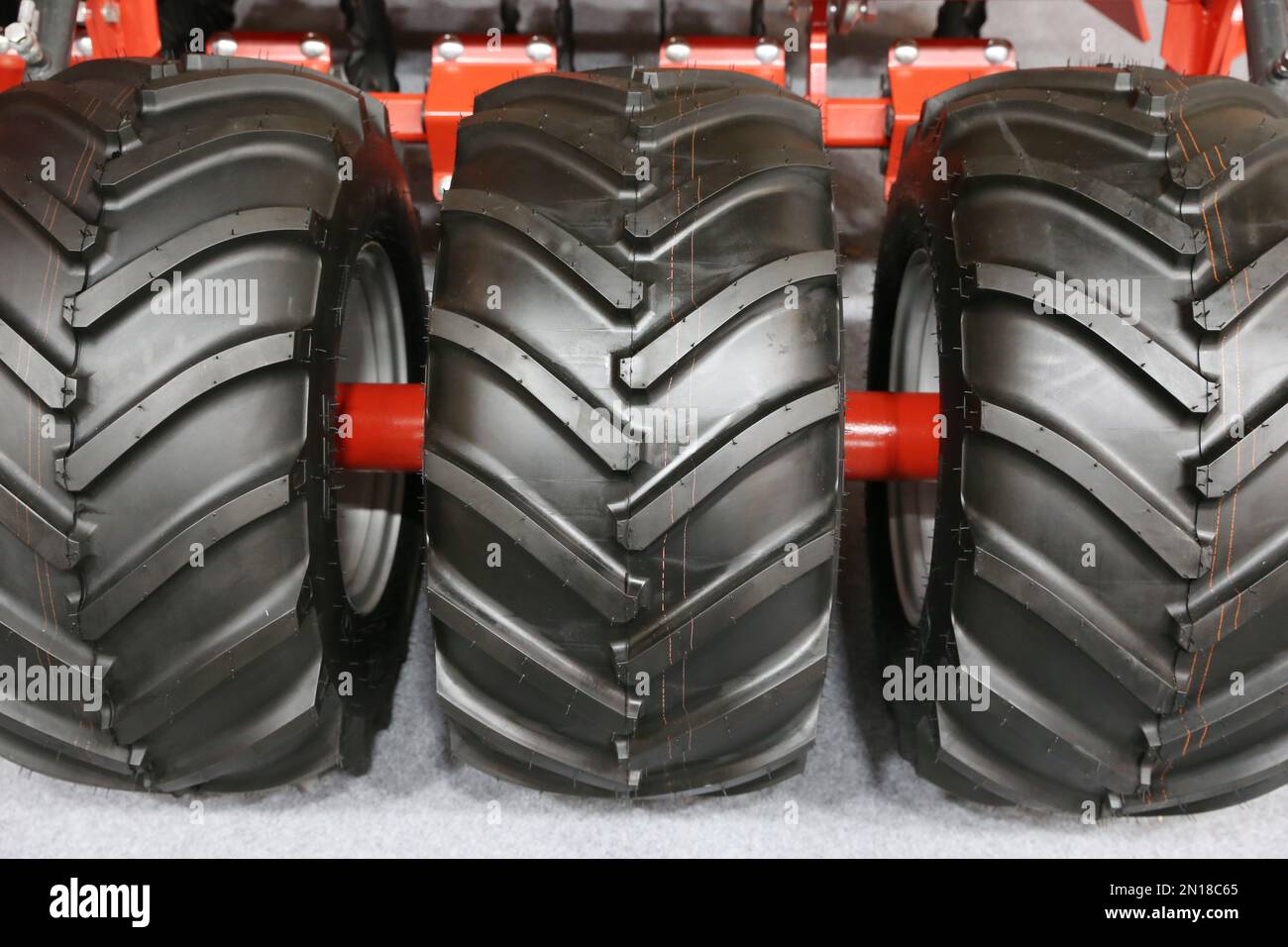 Details of tractor tire. Detail of large wheel. Heavy black wheel ...