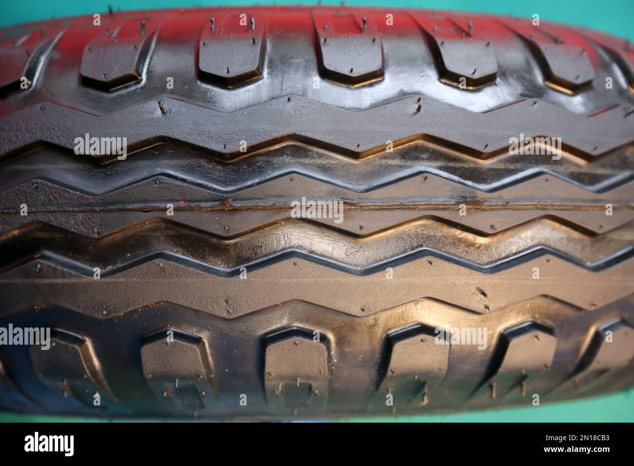 Details of tractor tire. Detail of large wheel. Heavy black wheel ...