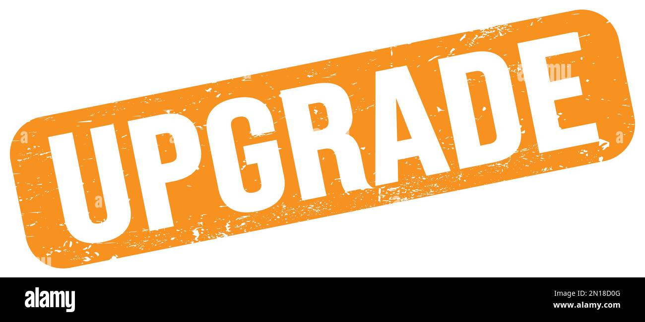 UPGRADE text written on orange grungy stamp sign Stock Photo - Alamy