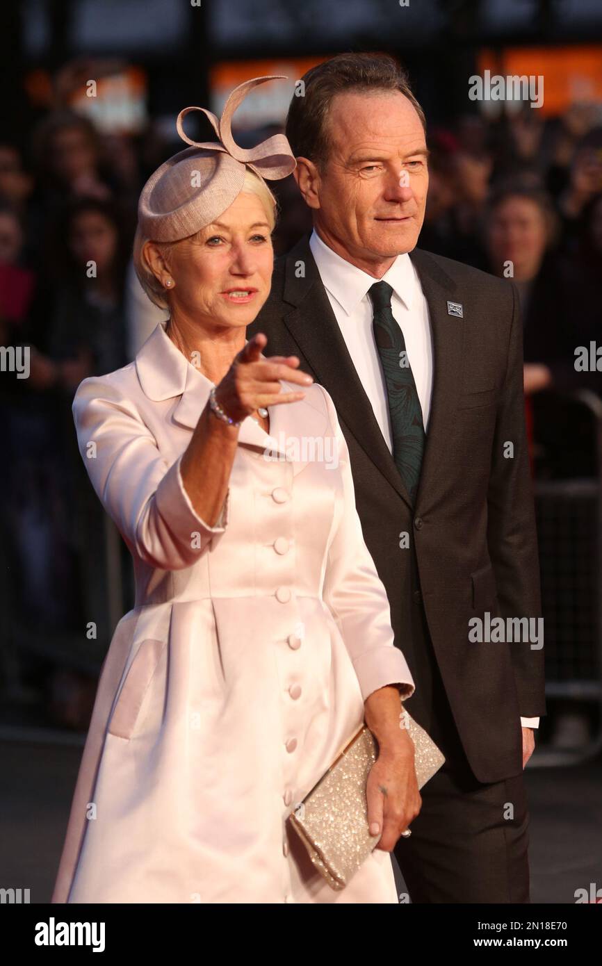 Helen Mirren, left, and Bryan Cranston pose for photographers upon ...