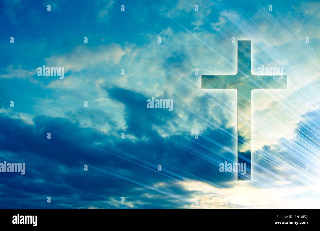 religious cross in the sky with divine lights rays Stock Photo - Alamy