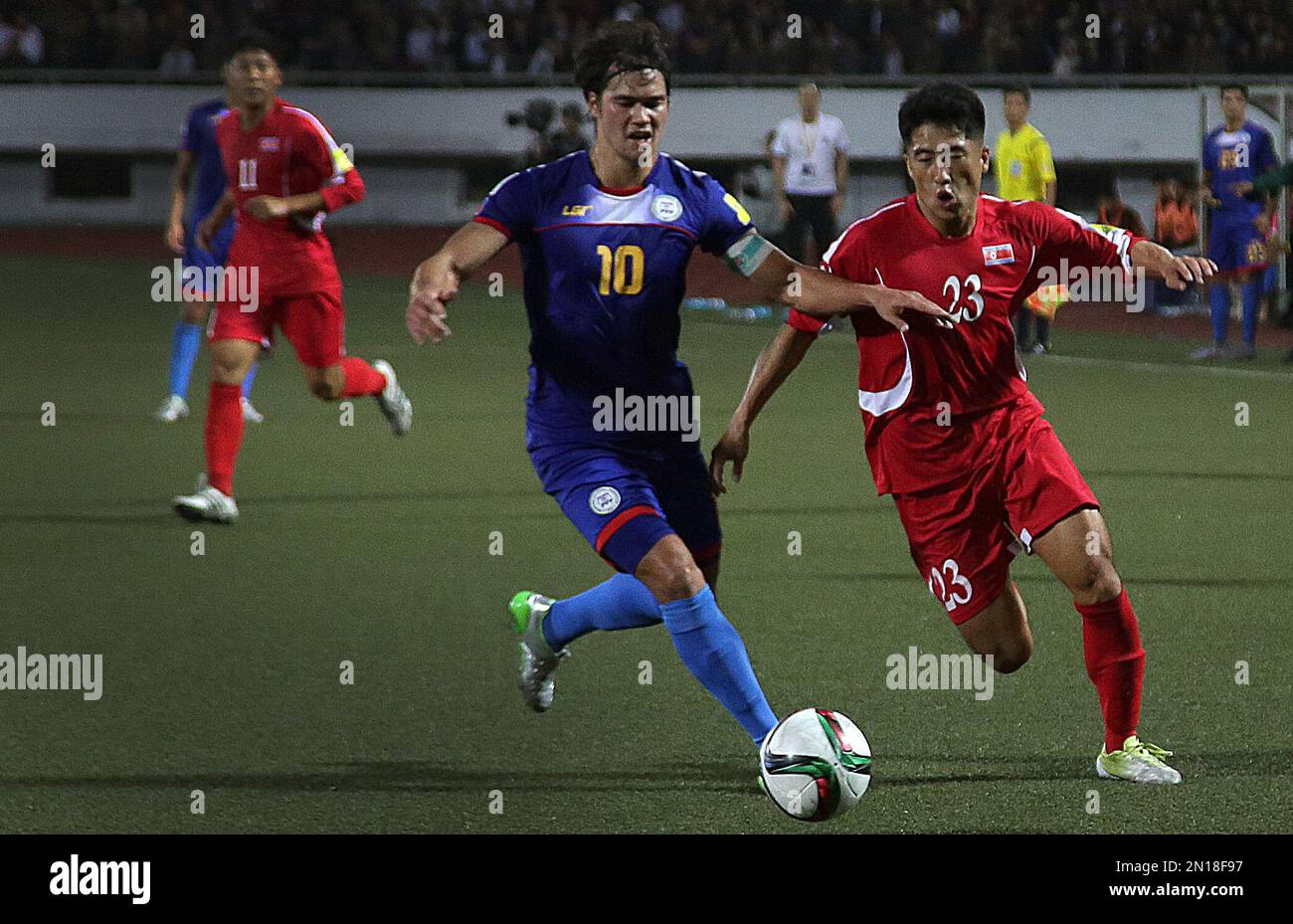 Philip Younghusband of the Philippines, left, and Ri Chol Myong of ...
