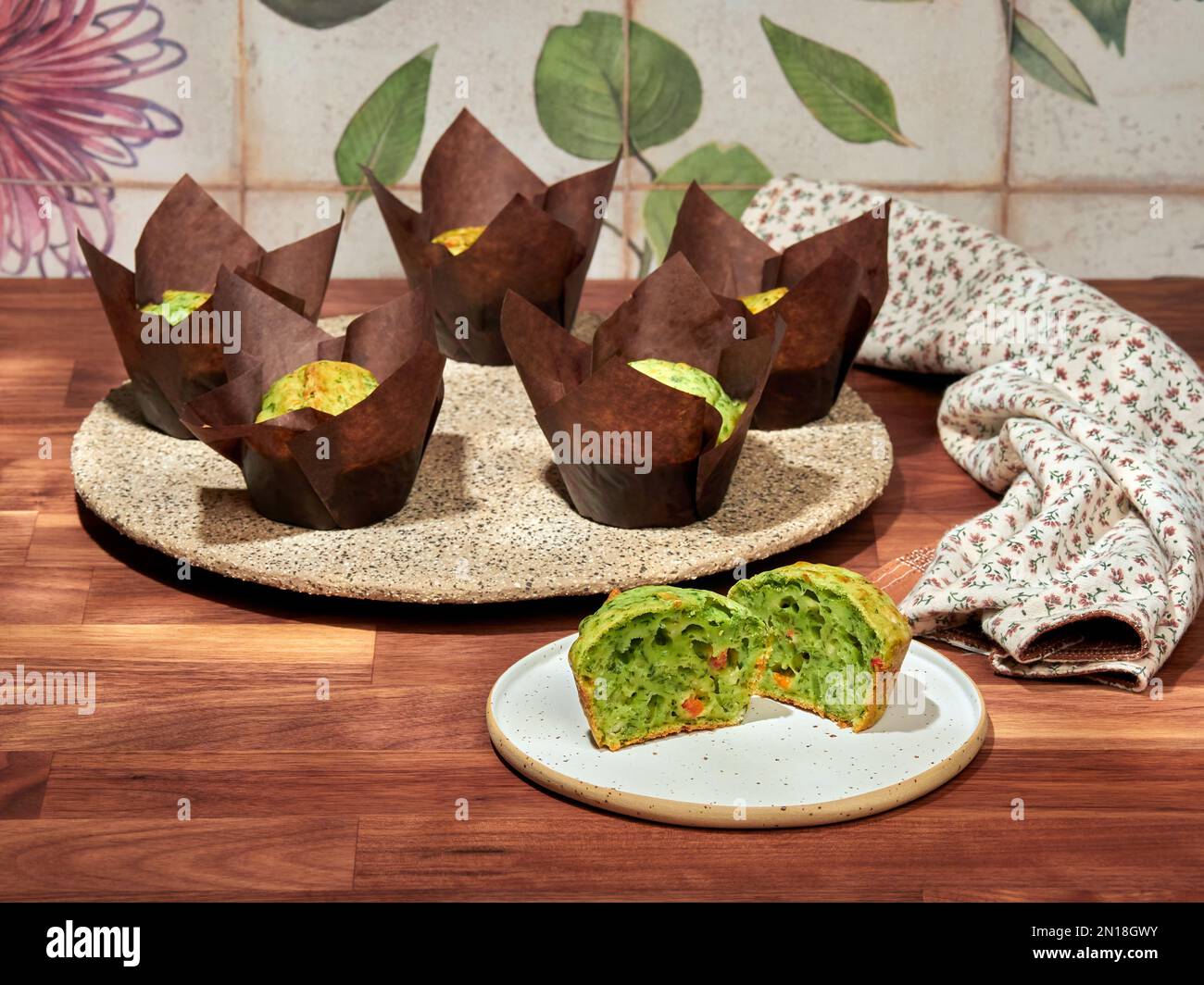 Homemamde savory muffins with spinach, red bell paper and feta, in ...