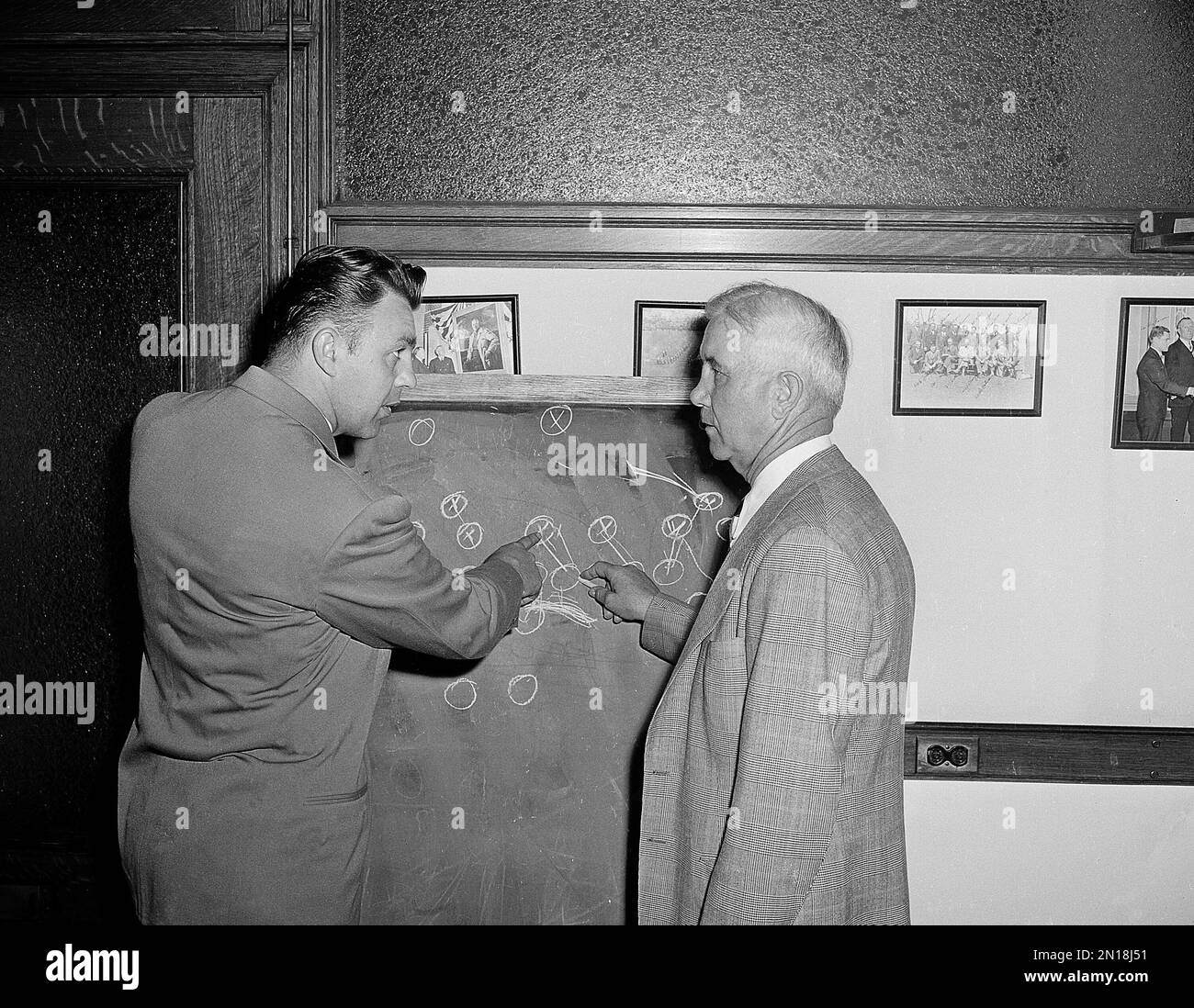 Two newly appointed coaches, Johnny Michelosen, left, of the Pittsburgh ...
