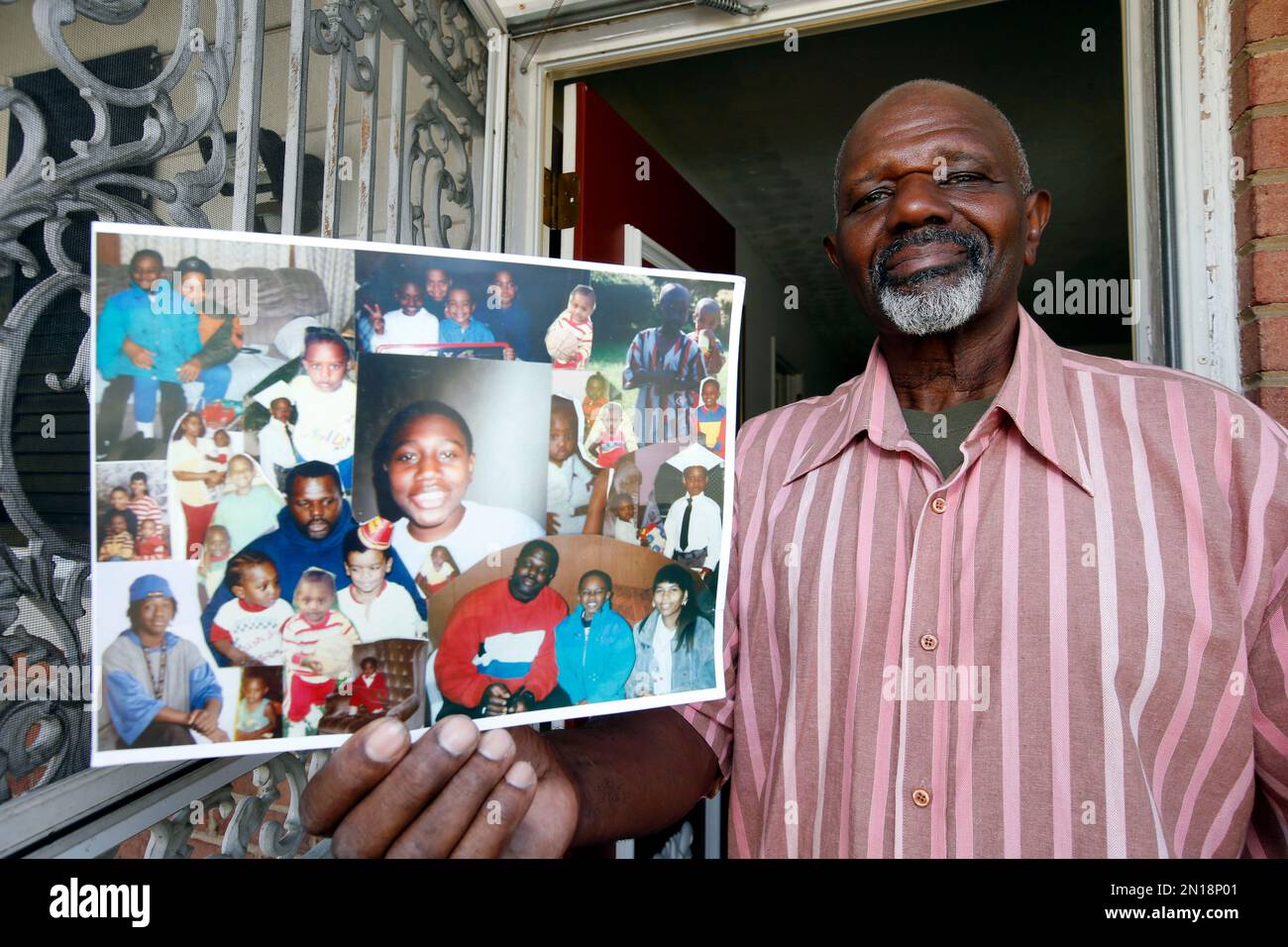 In this Sept. 16, 2015, photo, Kenneth Evans holds a composite of ...
