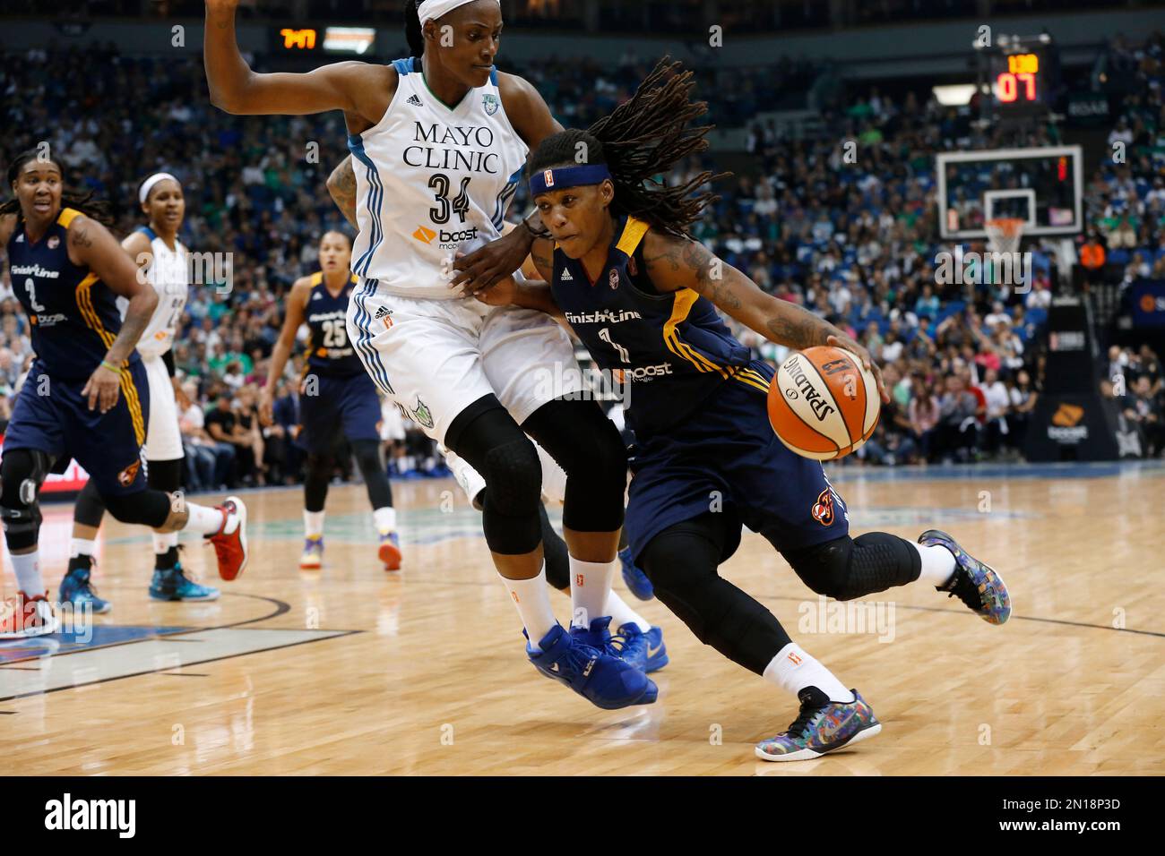 Indiana Fever guard Shavonte Zellous (1) drives on Minnesota Lynx ...