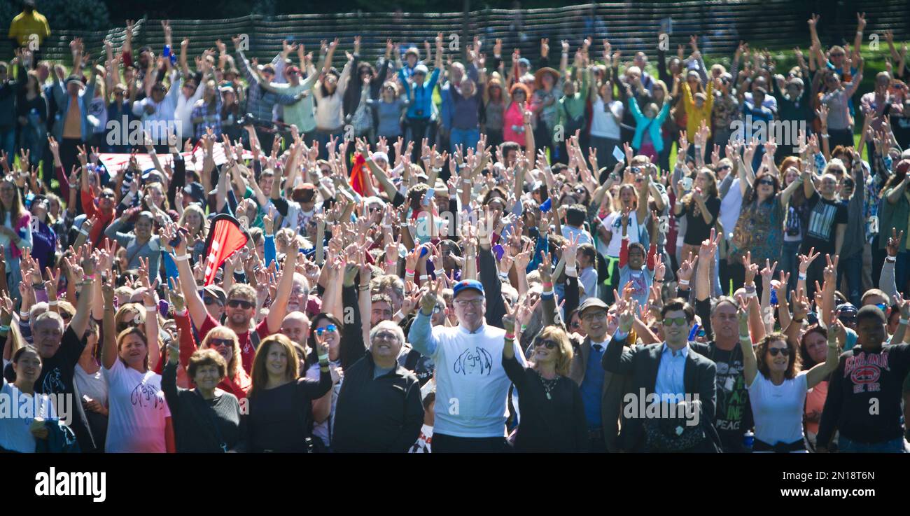 A crowd gathered in Central Park to form a human peace sign to remember ...