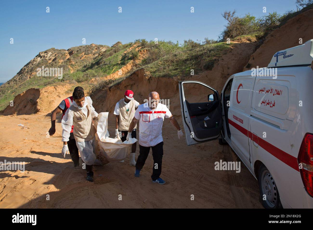 In this Monday, Oct. 5, 2015 photo, members of the Libyan Red Crescent ...