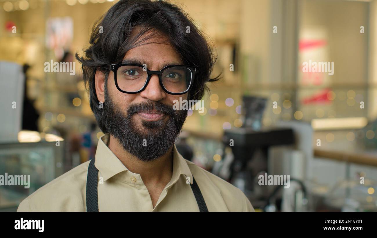 Successful small business Indian Arabian ethnic owner bearded man ...