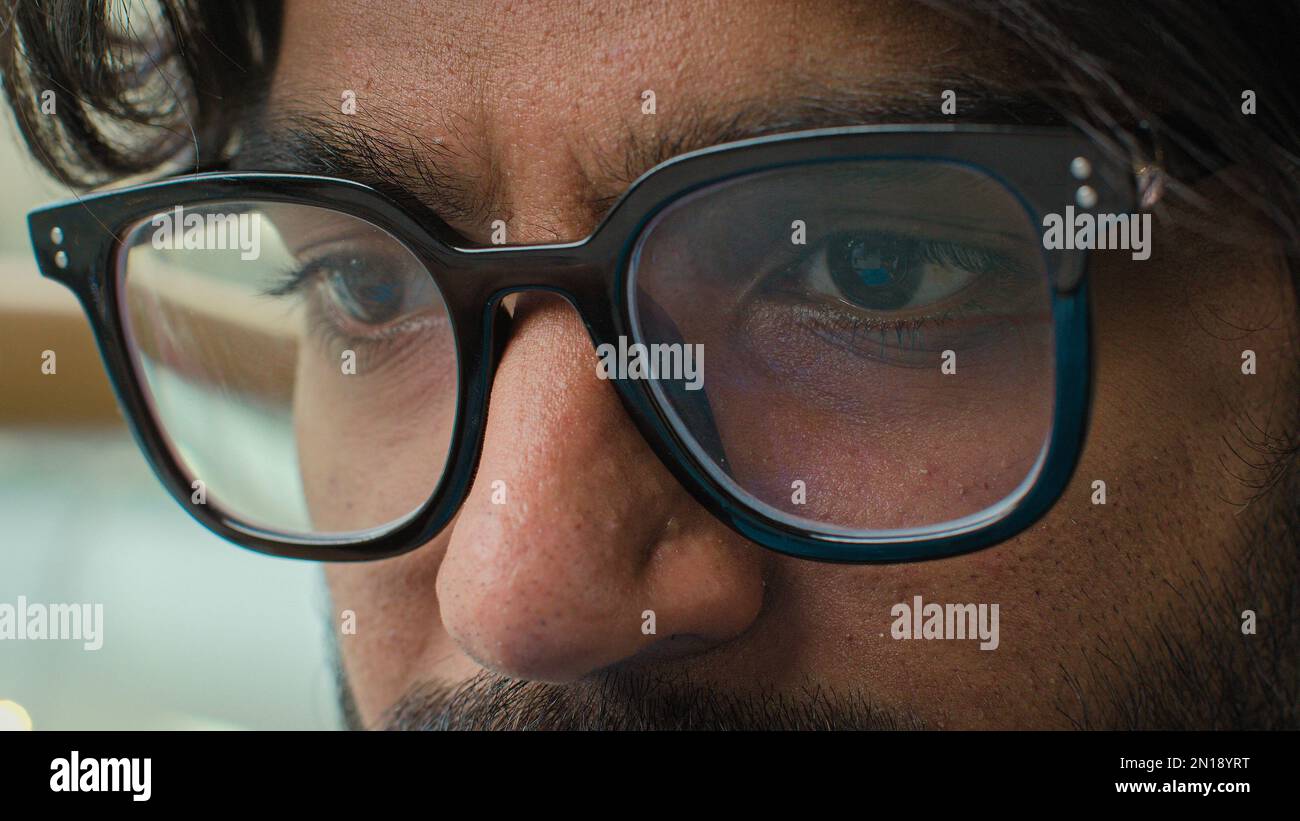 Close up view of male eyes businessman wearing computer glasses eyewear ...