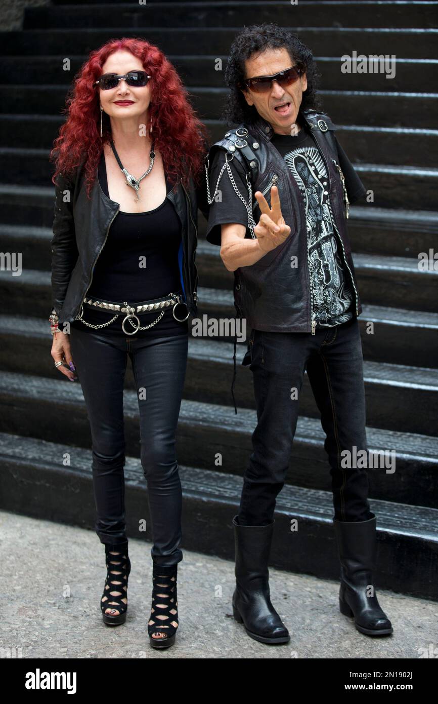 El Tri lead singer Alex Lora, right, poses with his wife and bandmember ...