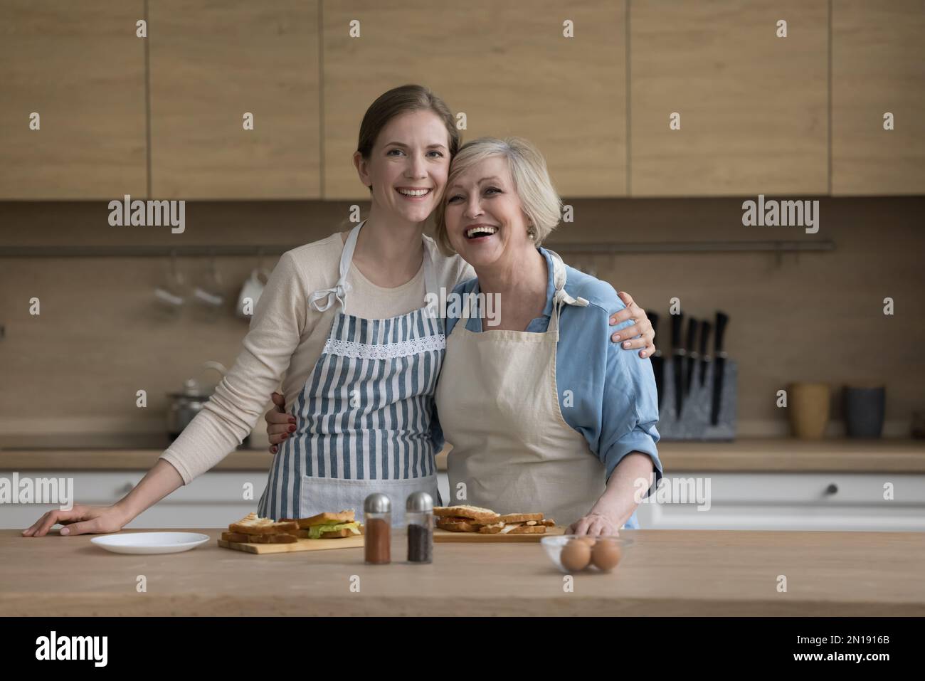 Old woman wearing aprons hi-res stock photography and images - Alamy