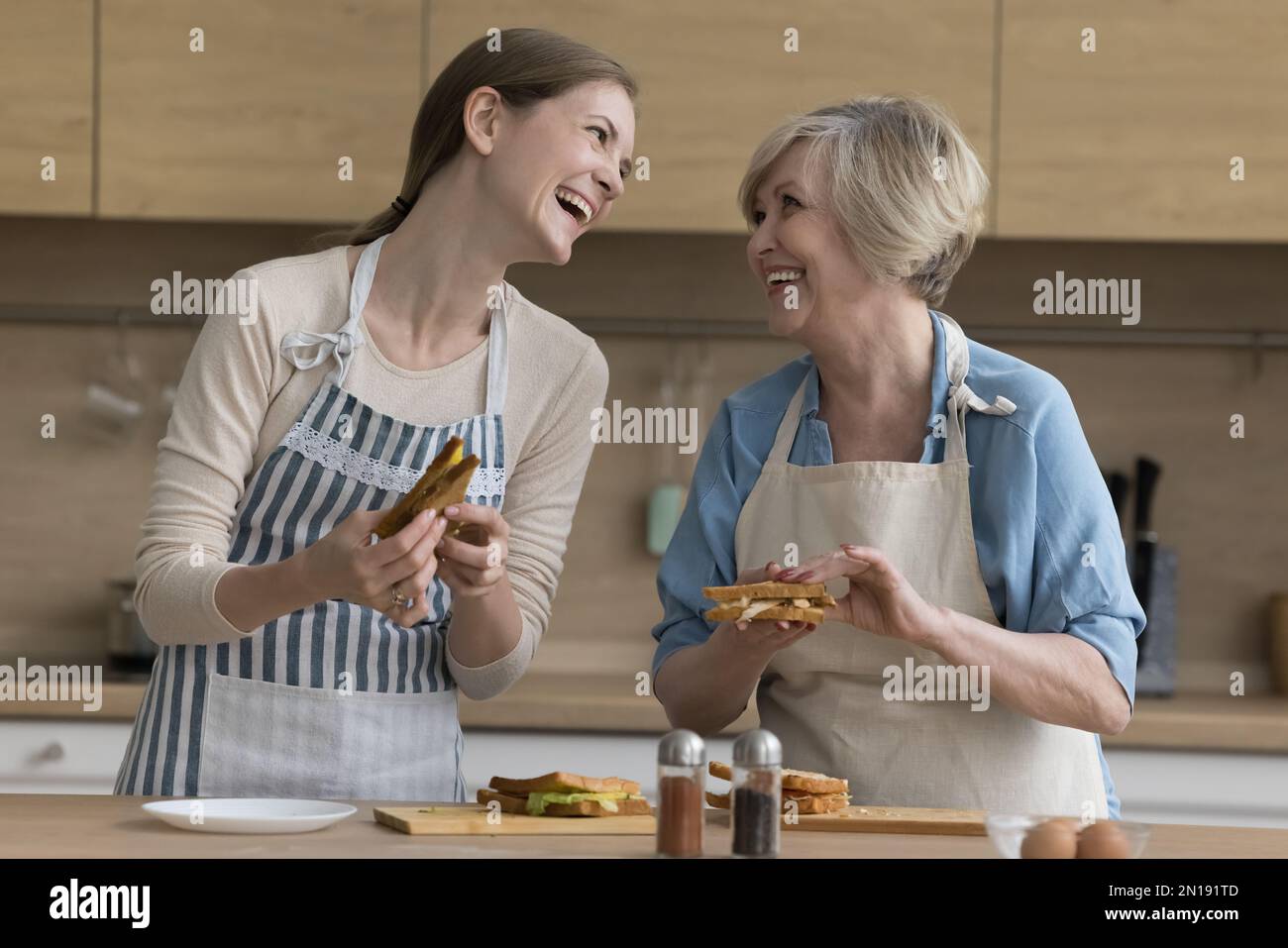 Old woman wearing aprons hi-res stock photography and images - Alamy