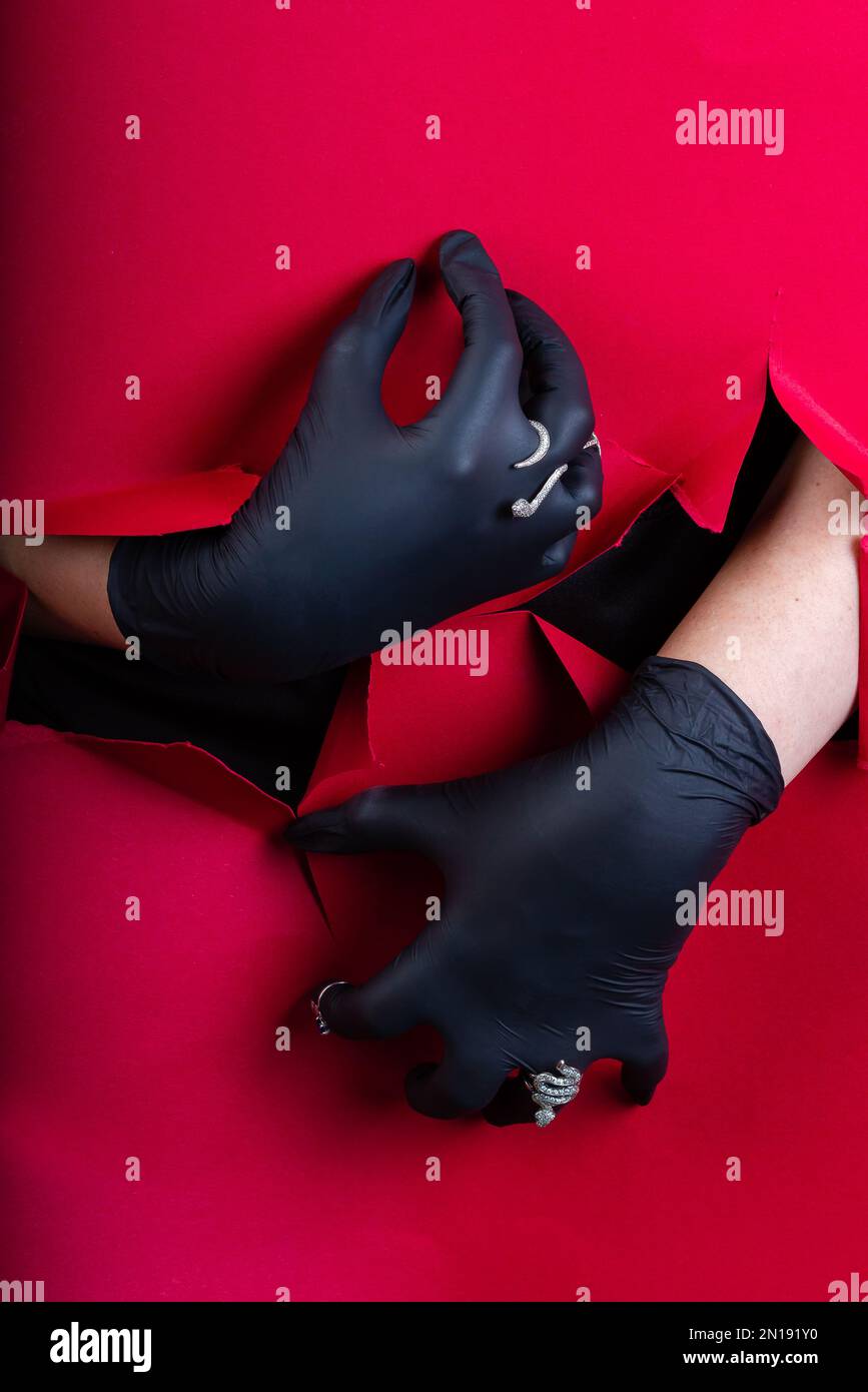 Hands breaking through wall hi-res stock photography and images - Alamy
