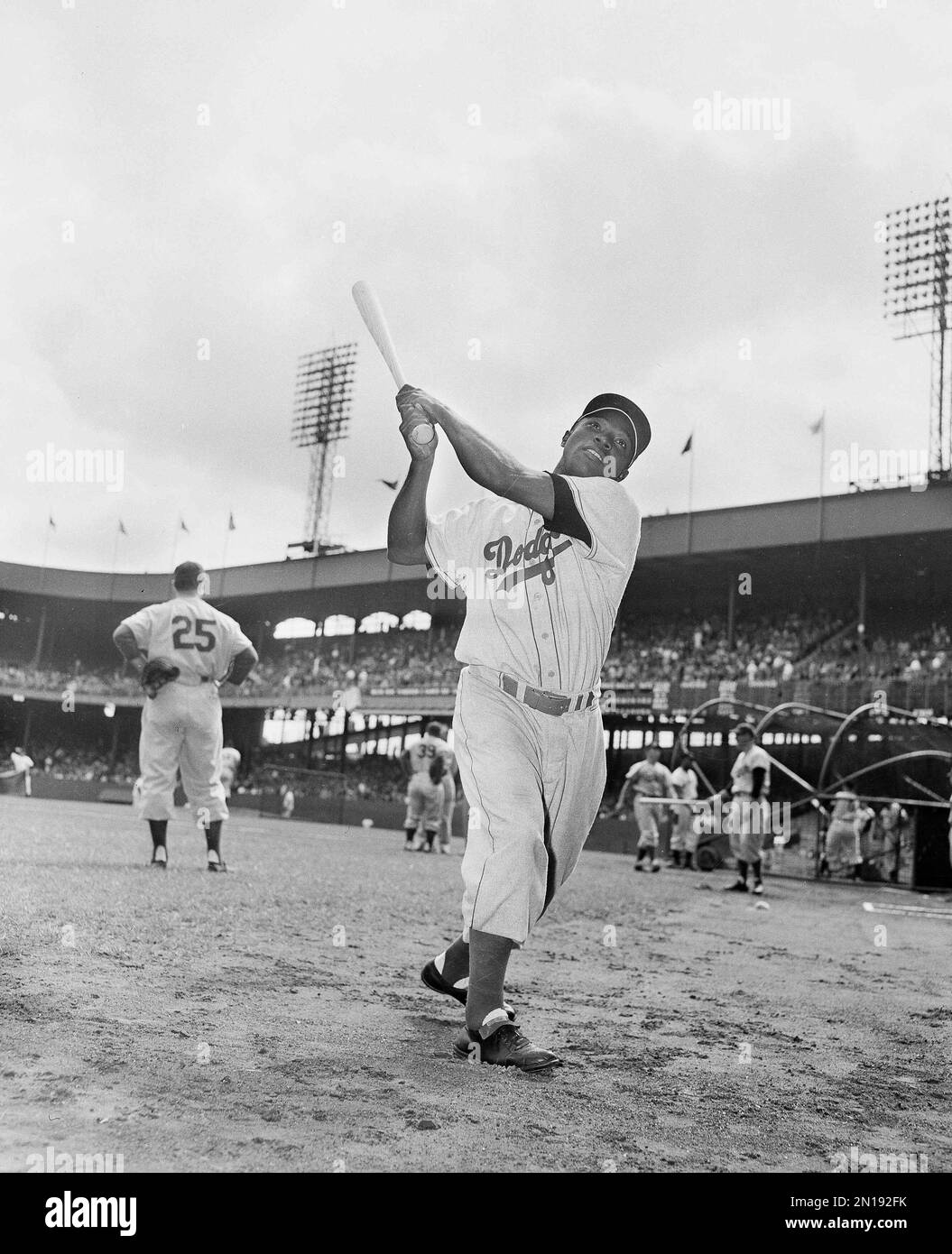 Brooklyn Dodgers outfielder Sandy Amoros is pictures swinging a bat at ...