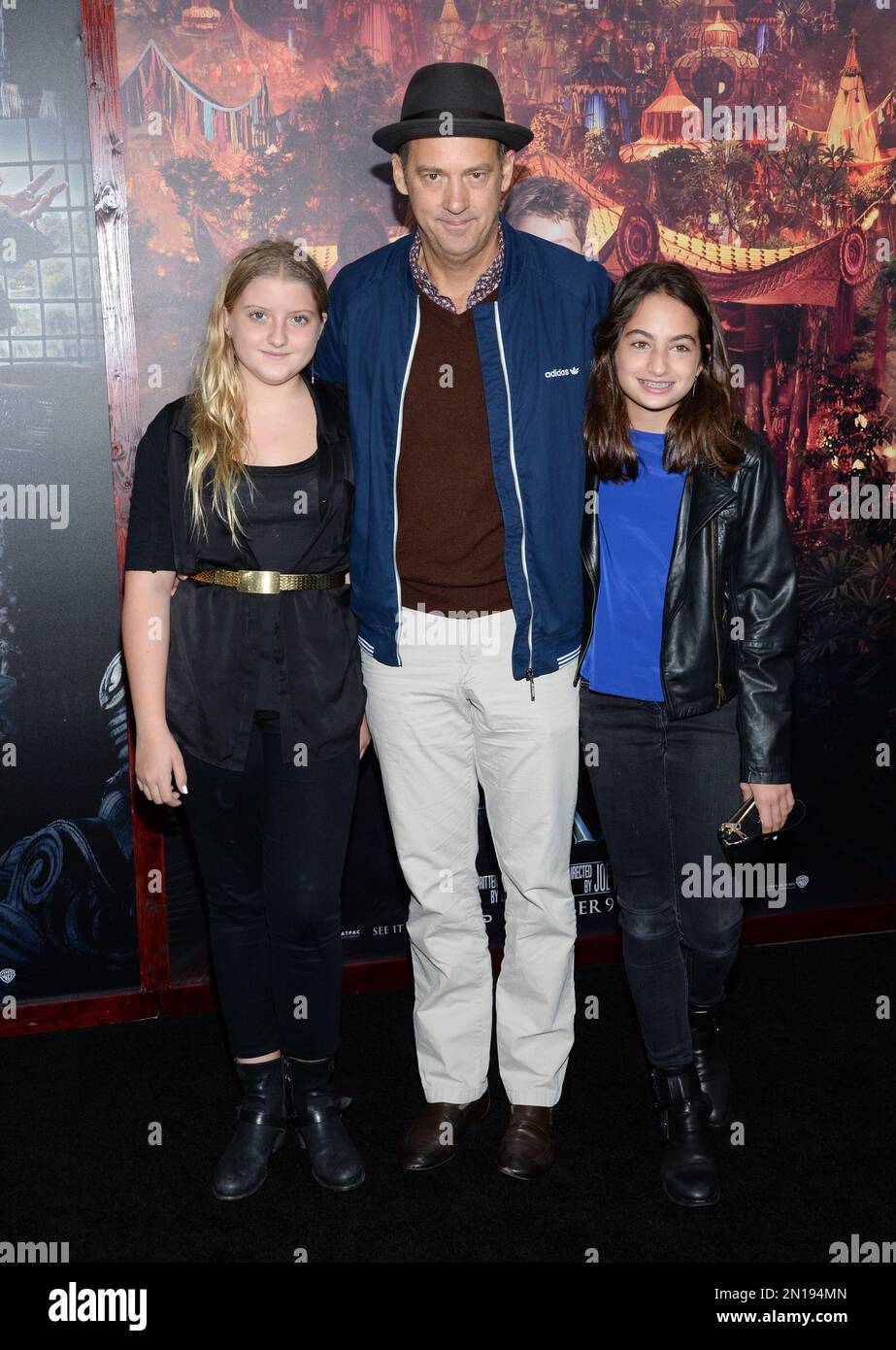 Anthony Edwards and his daughters attend the premiere of "Pan" at the ...