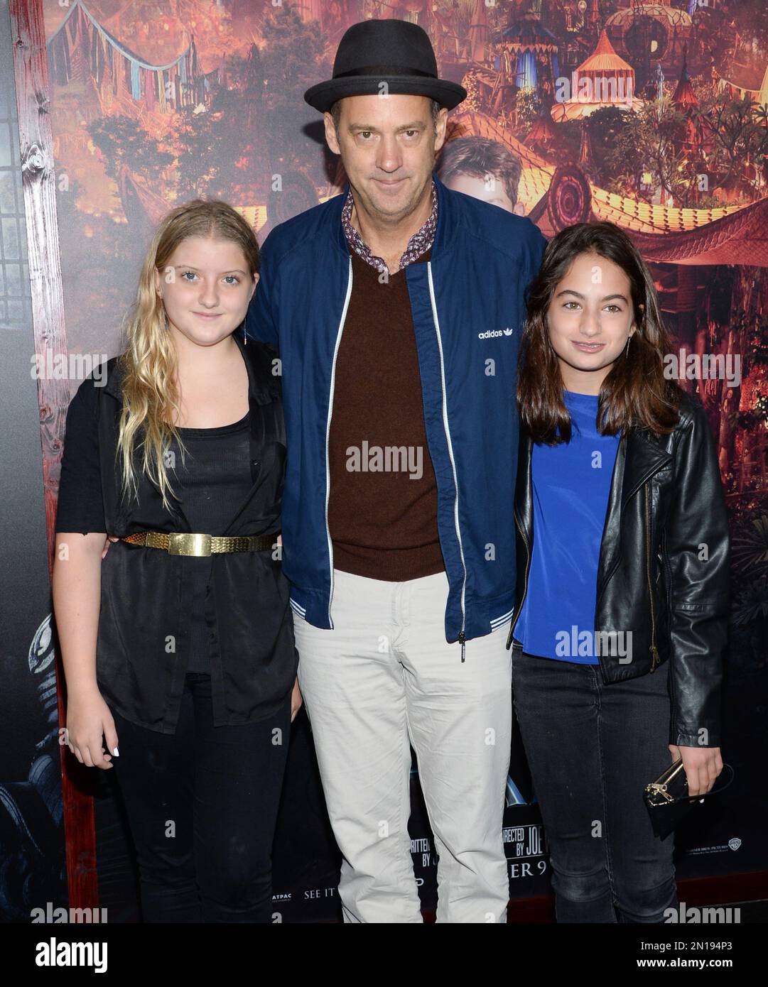 Anthony Edwards and his daughters attend the premiere of "Pan" at the ...