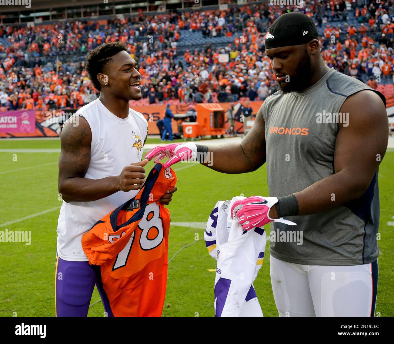 Minnesota Vikings wide receiver Stefon Diggs, left, and Denver Broncos ...