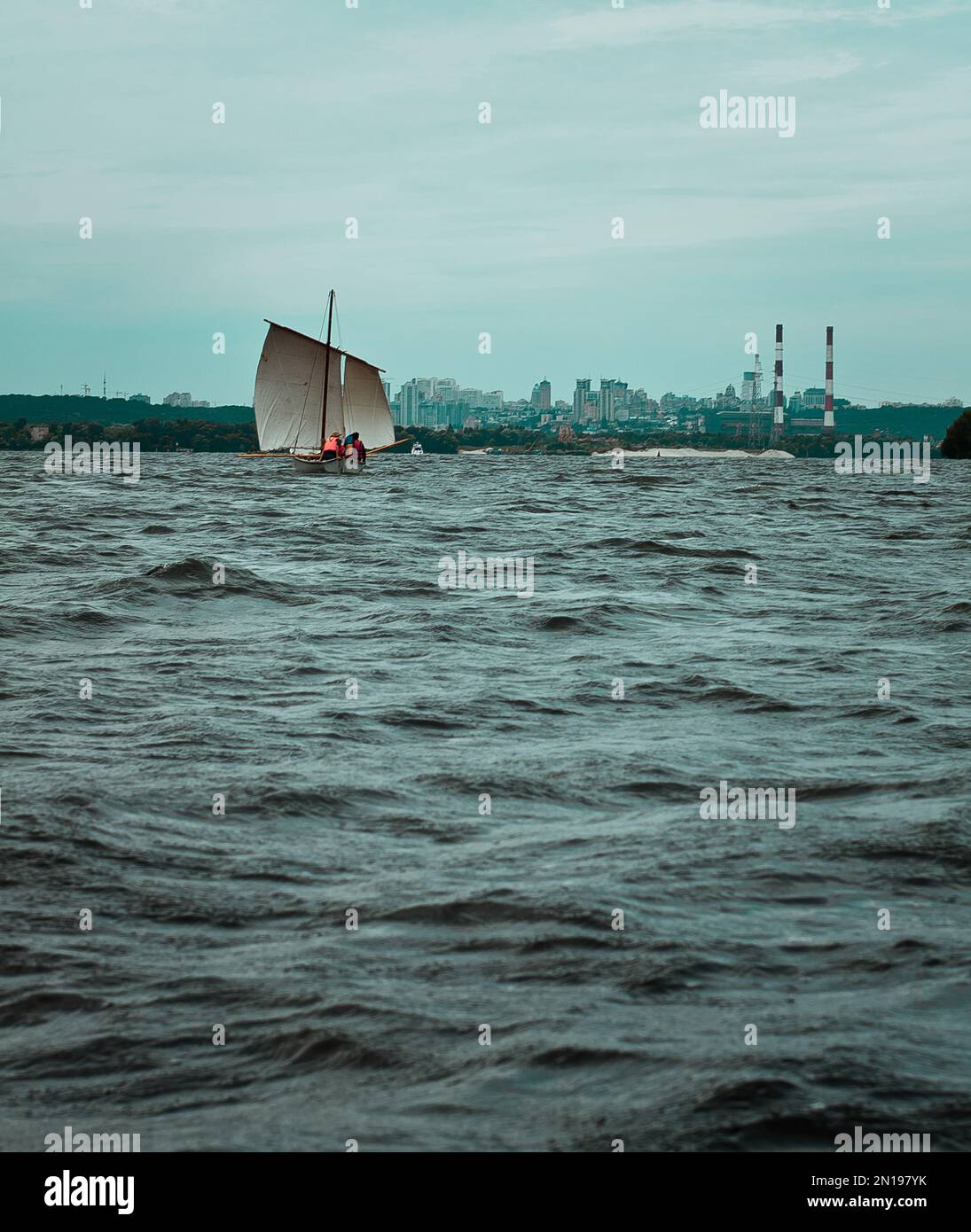 People floating on ship near coast landscape photo Stock Photo - Alamy