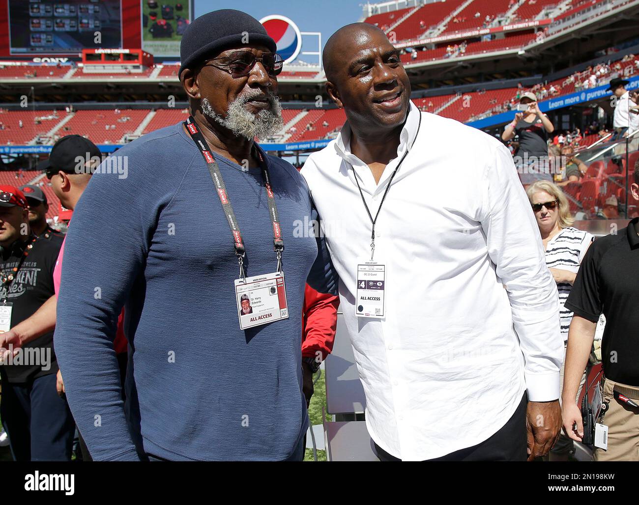 Dr. Harry Edwards, left, and former NBA basketball player Earvin "Magic ...