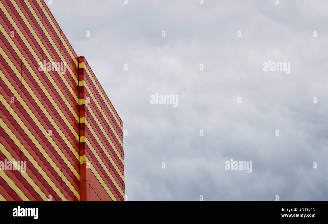 details of aluminum facade with colorful red panels. modern building ...