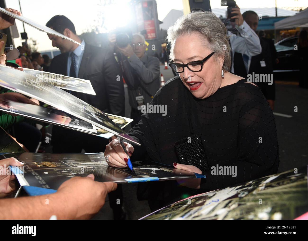 Kathy Bates signs autographs as she arrives at the Los Angeles premiere ...