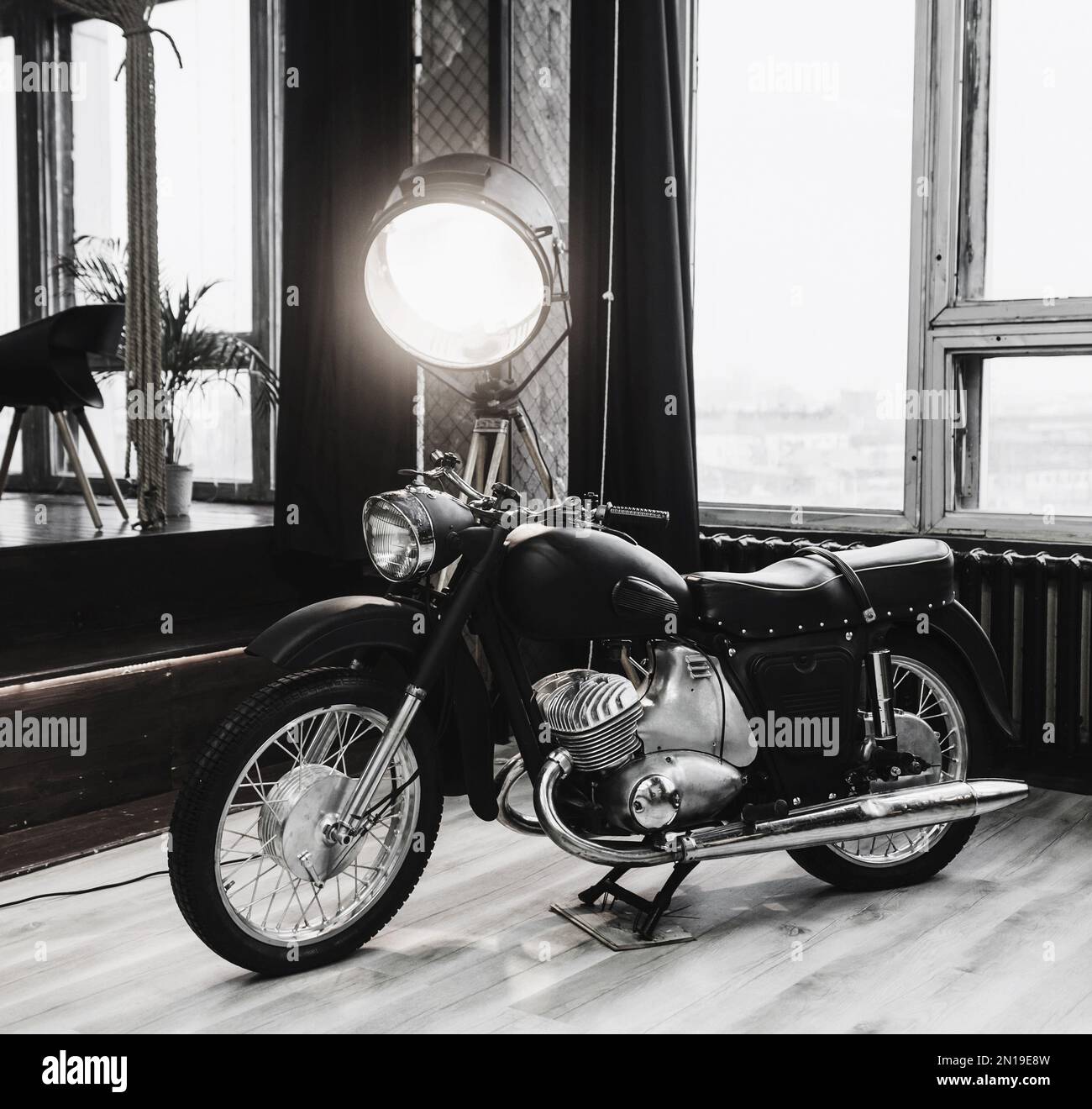 classic retro motorcycle in the garage or workshop. vintage bike Stock ...