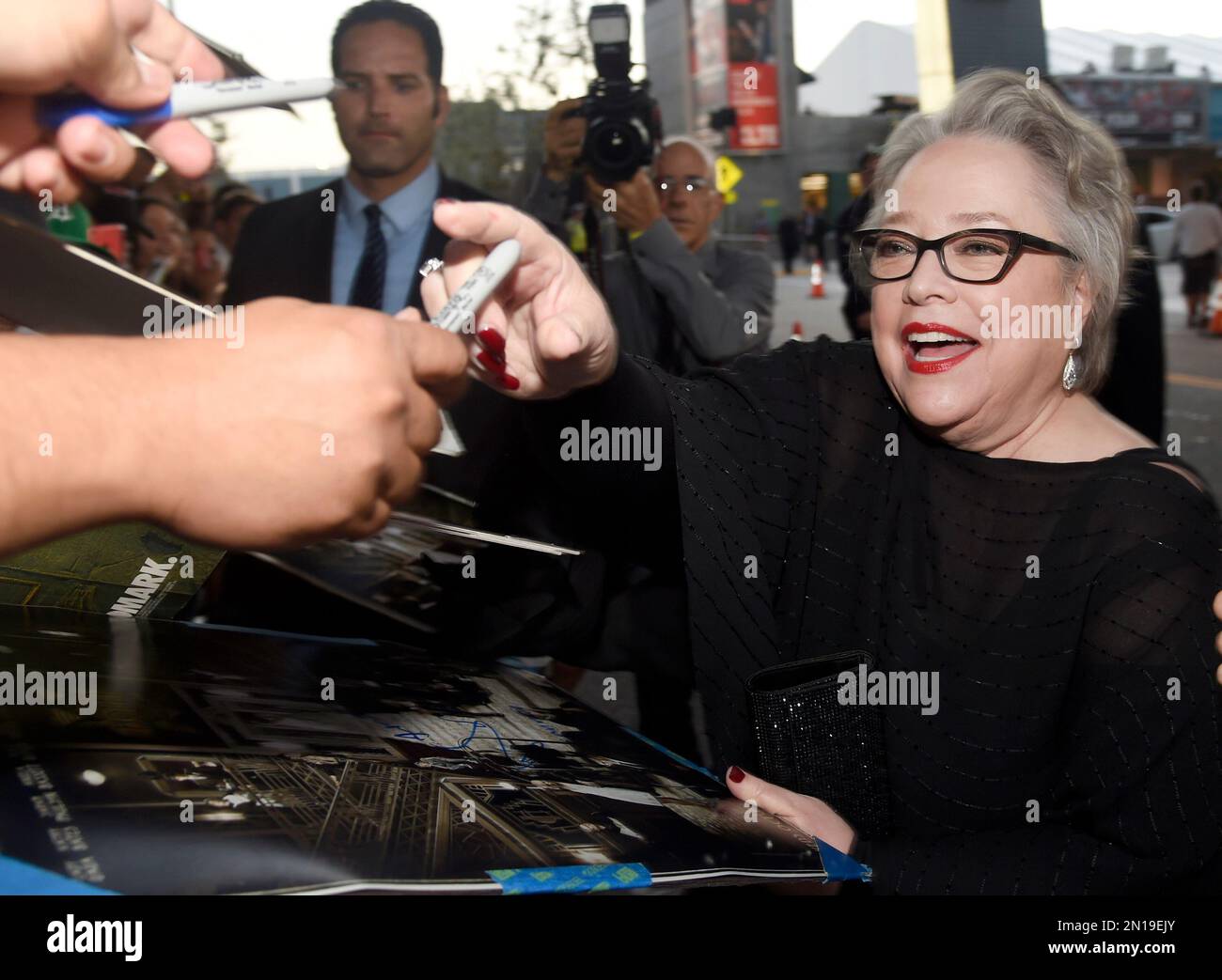 Kathy Bates signs autographs as she arrives at the Los Angeles premiere ...