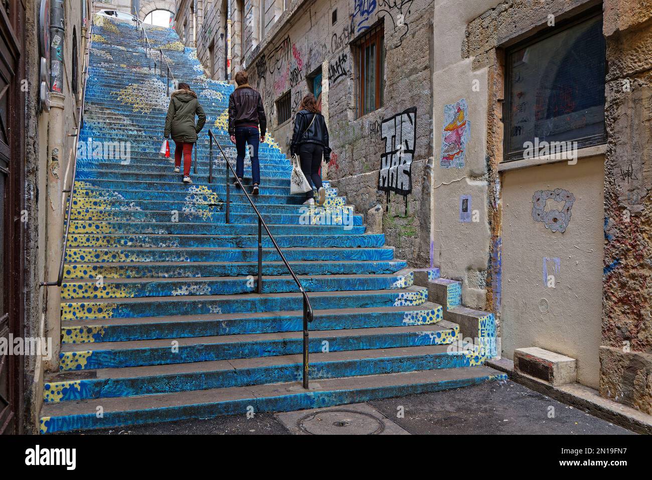 LYON, FRANCE, February 4, 2023 : Painted stairs of Passage Mermet, a ...