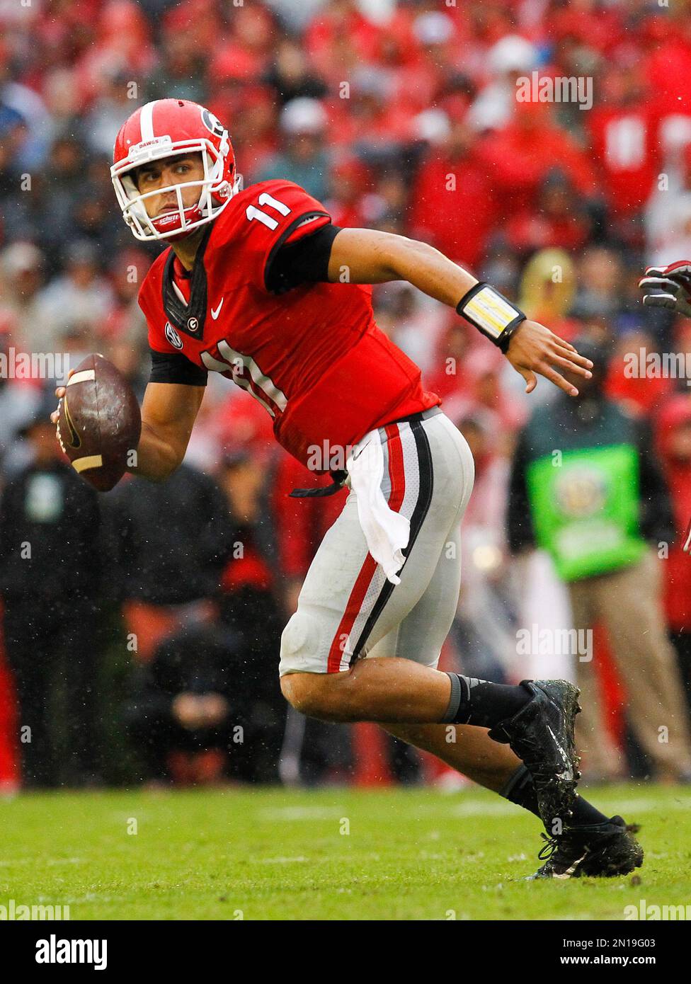 Georgia quarterback Greyson Lambert (11) scrambles against Alabama in ...