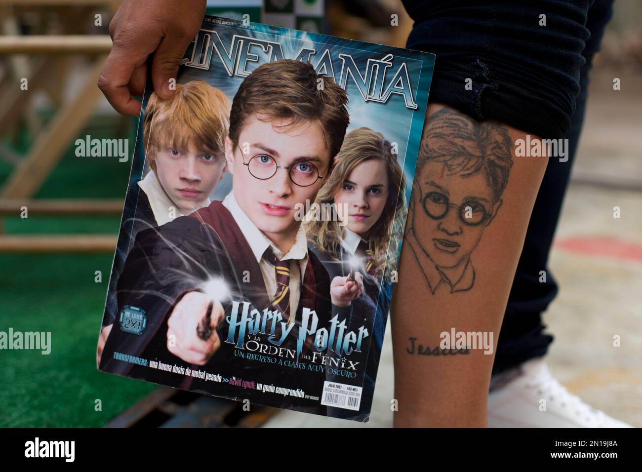 In this Sept. 29, 2015 photo, a Harry Potter fan shows off her tattoo ...