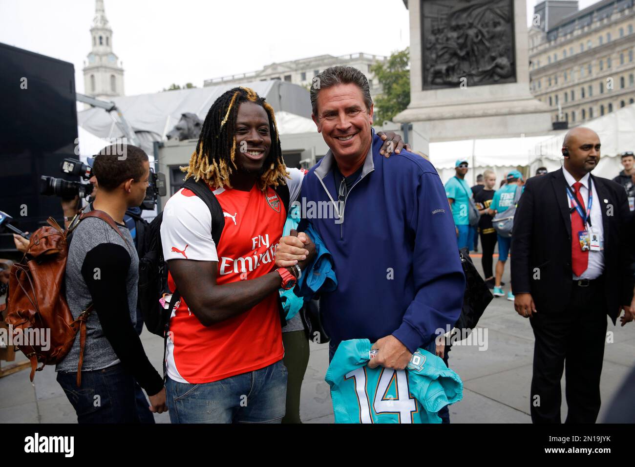 Miami Dolphins running back Jay Ajayi, left, wearing an Arsenal soccer ...