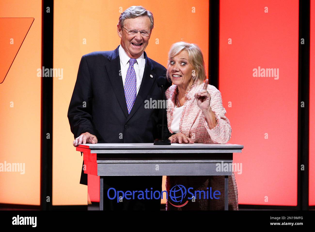 Dr. Bill Magee, left, and Kathy Magee speak on stage at the 2015 ...