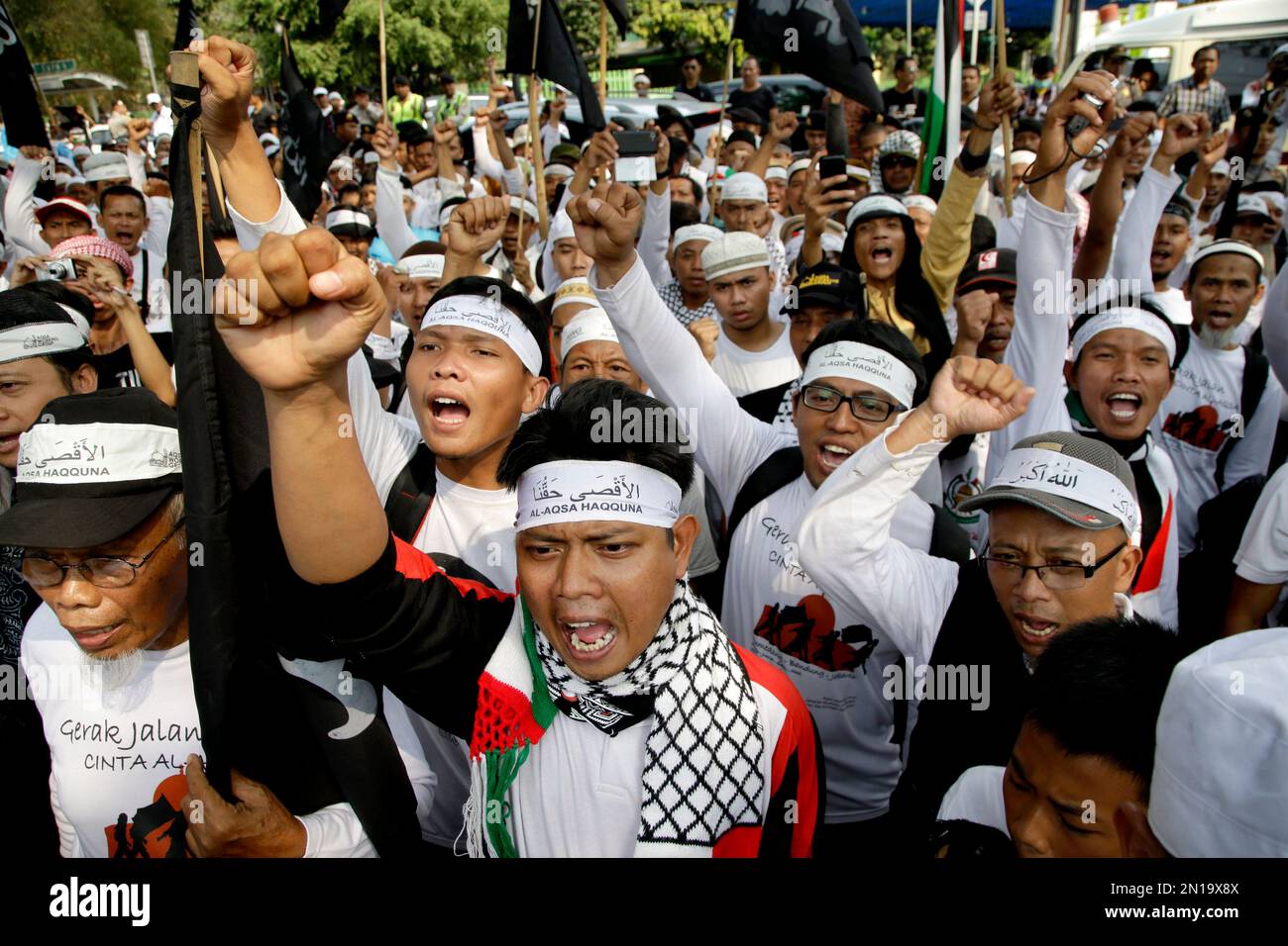 Muslim men shout slogans during a rally supporting the Al-Aqsa mosque ...