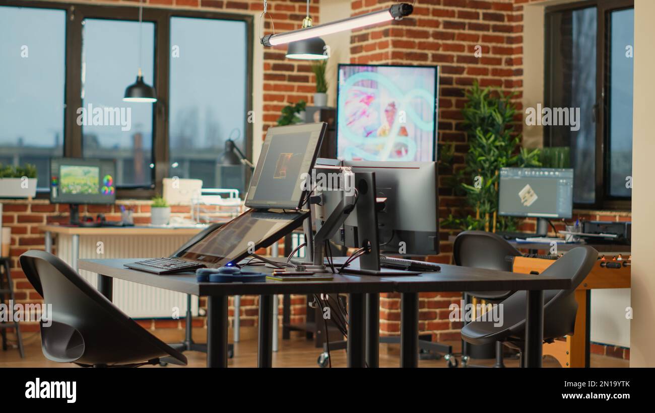 Creative agency modern office with multiple monitors to work on ...