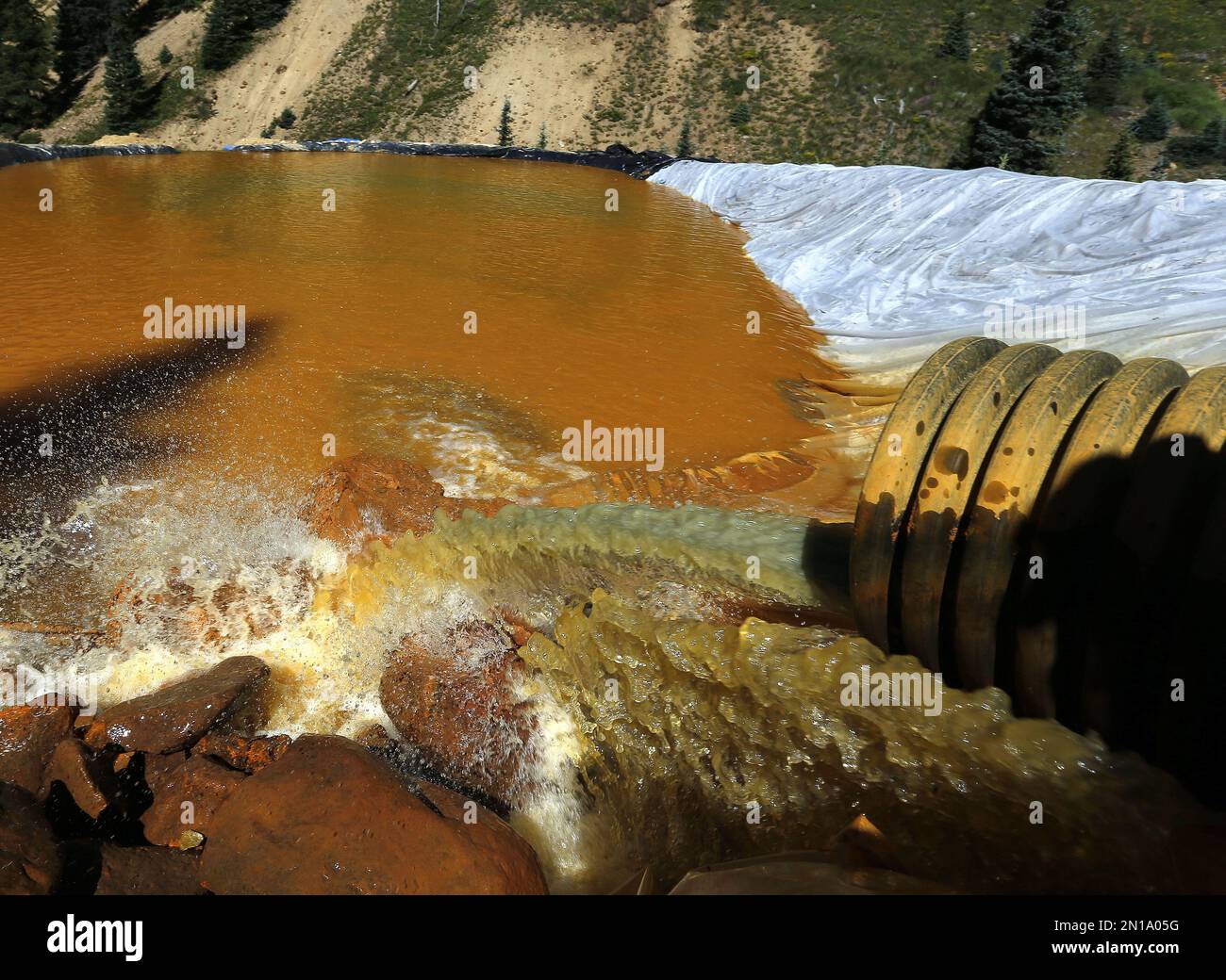 FILE - In this Aug. 14, 2015 file photo, water flows through a series ...