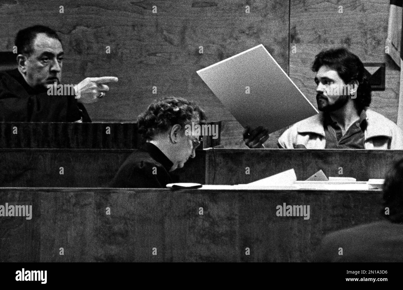 Former Klansman James "Tiger" Knowles holds chart with KKK officers ...